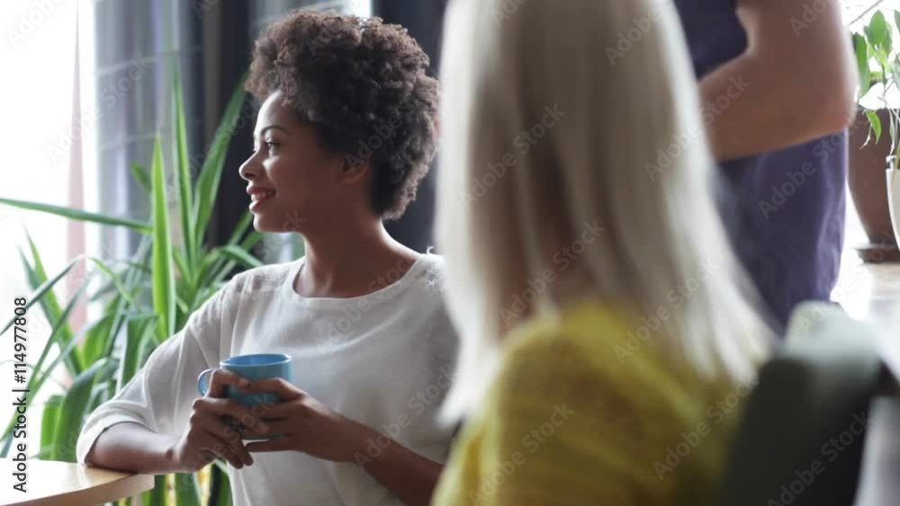 happy creative team drinking coffee in office Stock Video | Adobe Stock