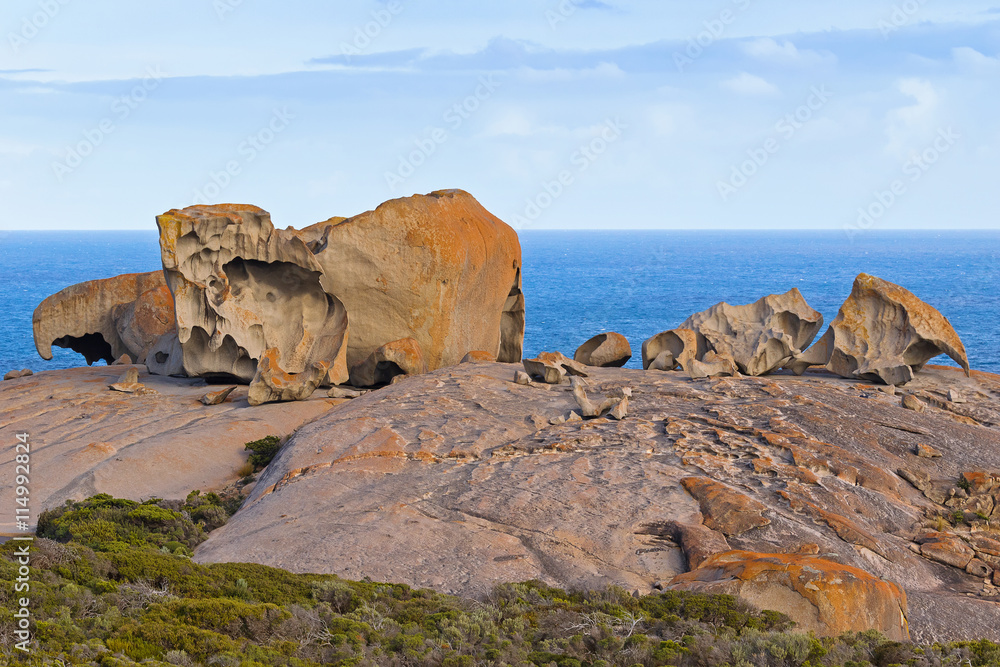 Remarkable Rocks, natural rock formation covered by golden orange ...