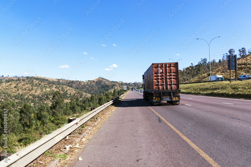 Heavy Duty Container Truck Travelling Along Highway Stock Photo | Adobe ...