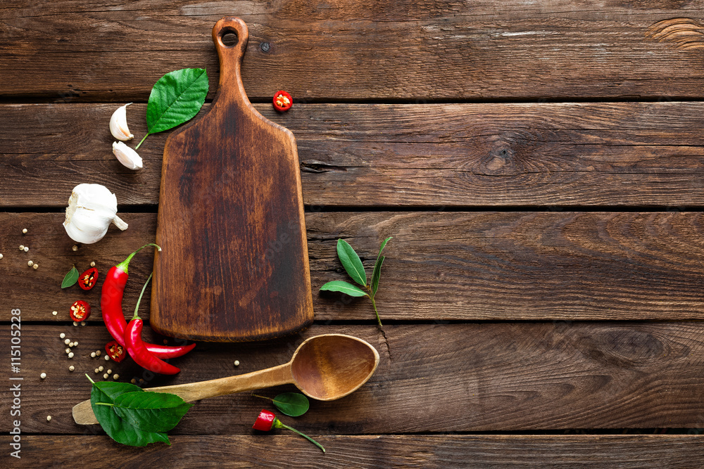 dark culinary background with various herbs and spices, top view ...