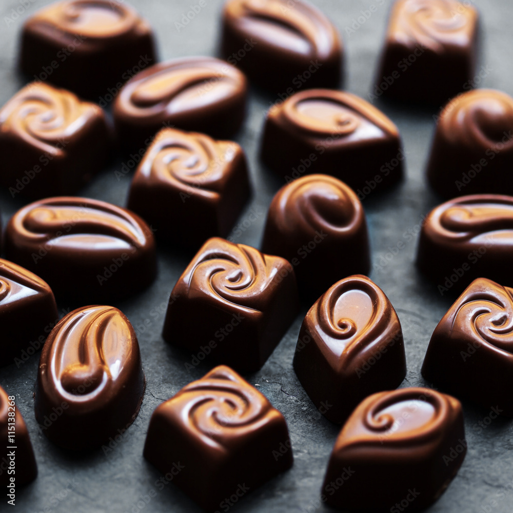 ..Chocolate over black background. Chocolate Candy, Cocoa. Assor Stock ...