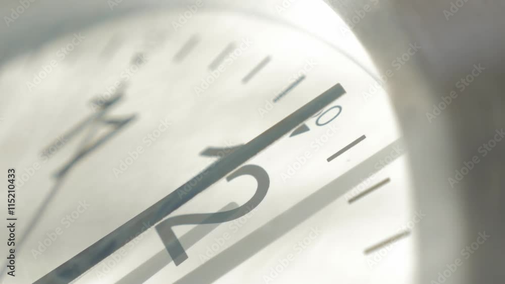 Analog clock needles slow moving on the wall 4K 2160p UHD footage ...