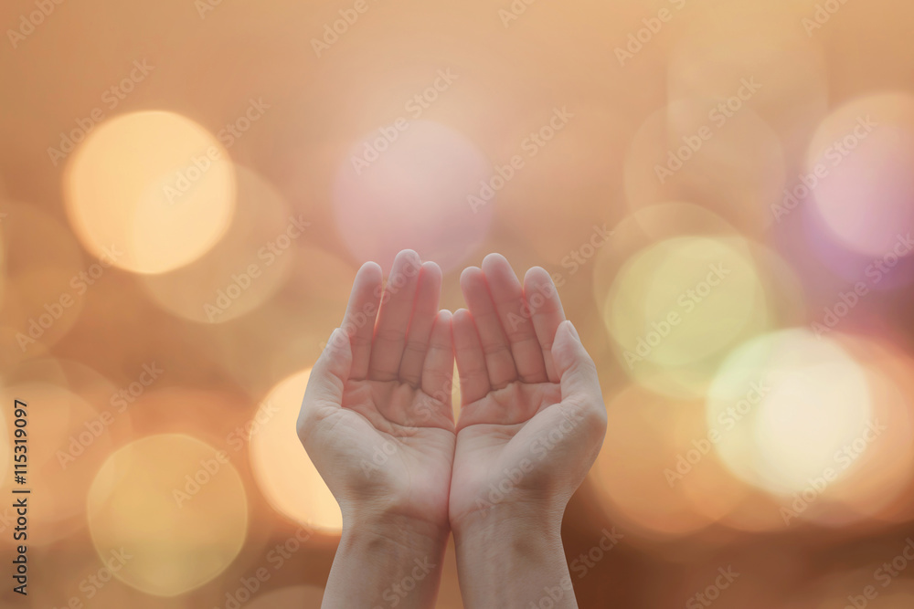 Empty female open human hands with palms up on blurred abstract ...