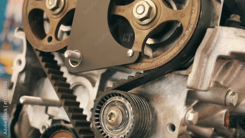 Pulleys, pinch rollers and timing belt of the internal combustion ...