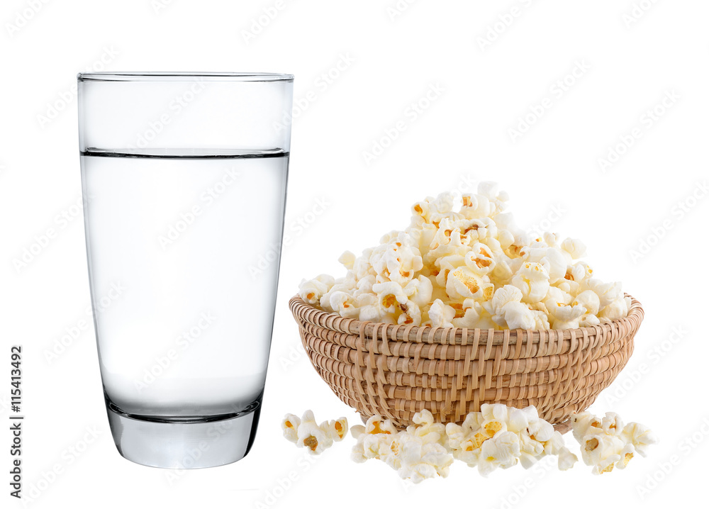 Glass of water and popcorn in basket isolated on white backgroun Stock ...