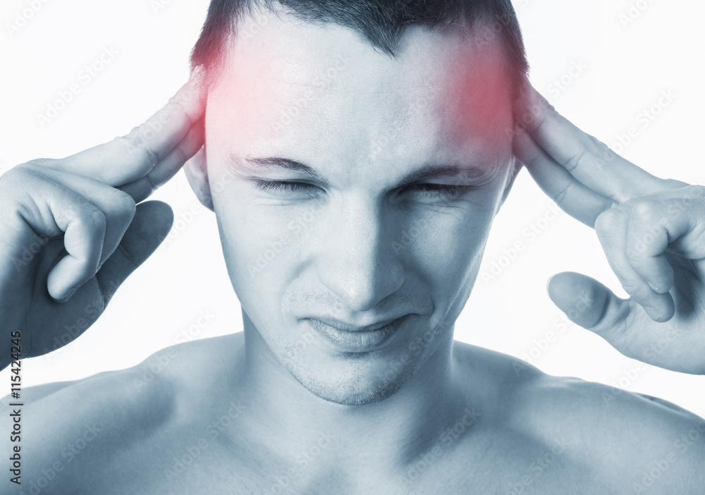 Closeup headshot man suffering from headache hands on head isolated on ...