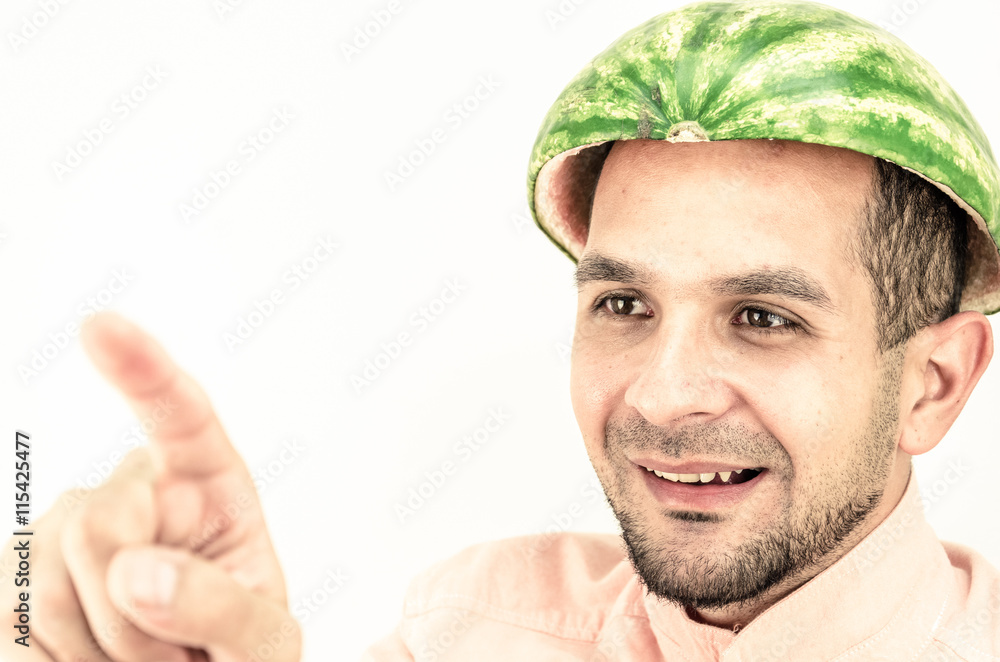 Funny man with a watermelon on his head. Hat covers the head Stock ...