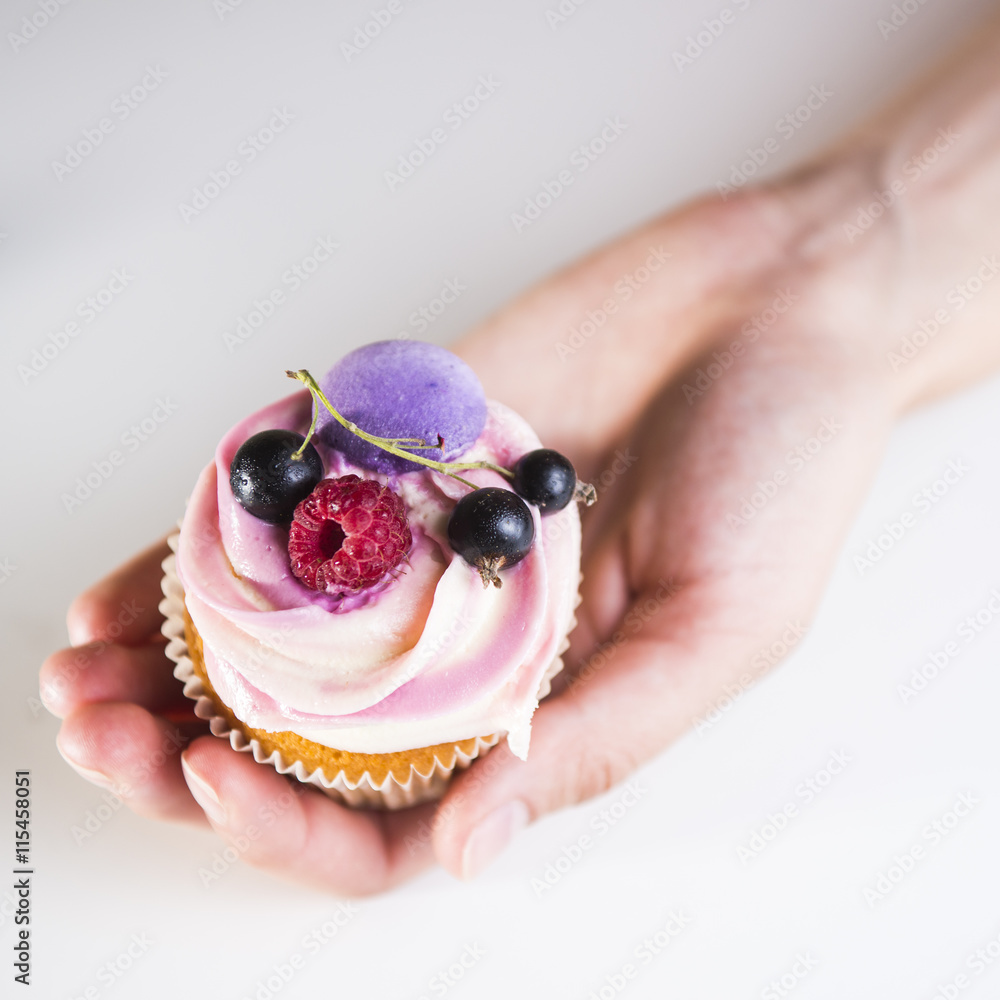 cake in hand Stock Photo | Adobe Stock