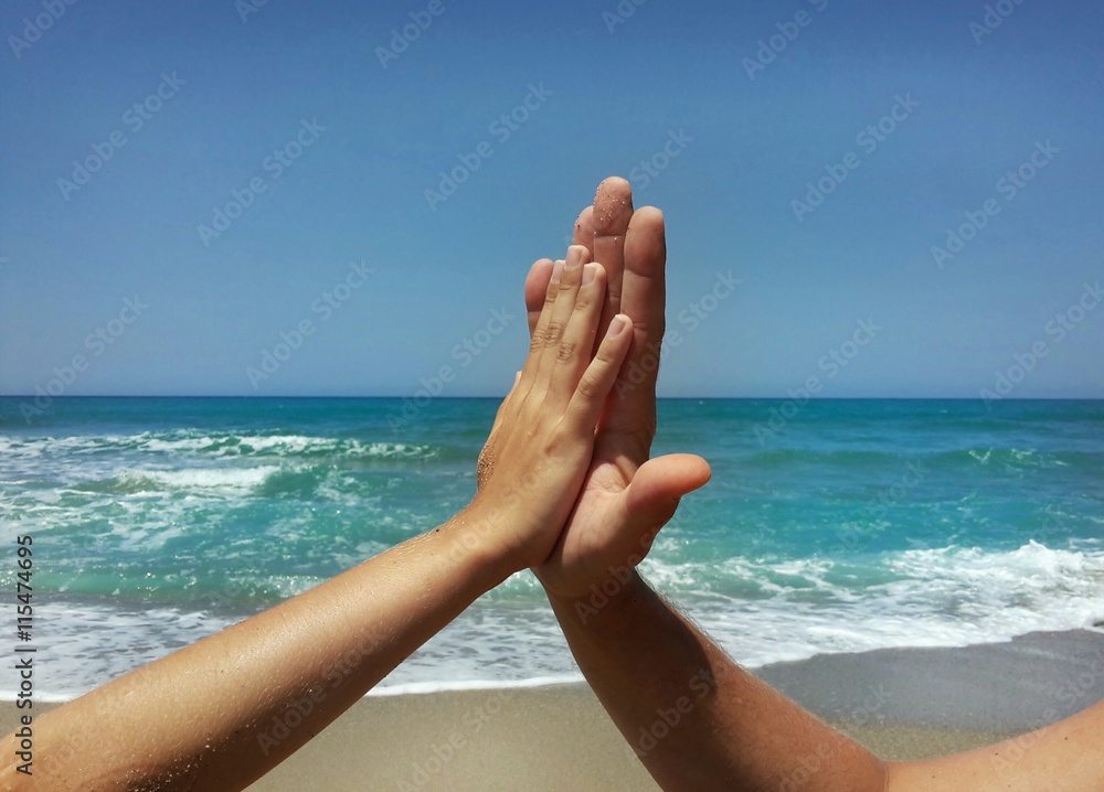High five at the beach Stock Photo | Adobe Stock