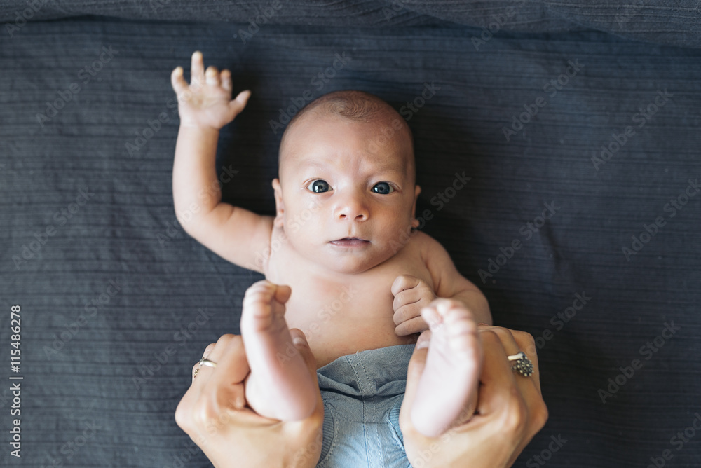 Mother Burping Her Little Newborn Baby Stock Photo | Adobe Stock