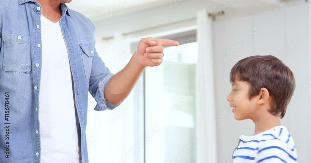 Angry father scolding his son Stock Video | Adobe Stock
