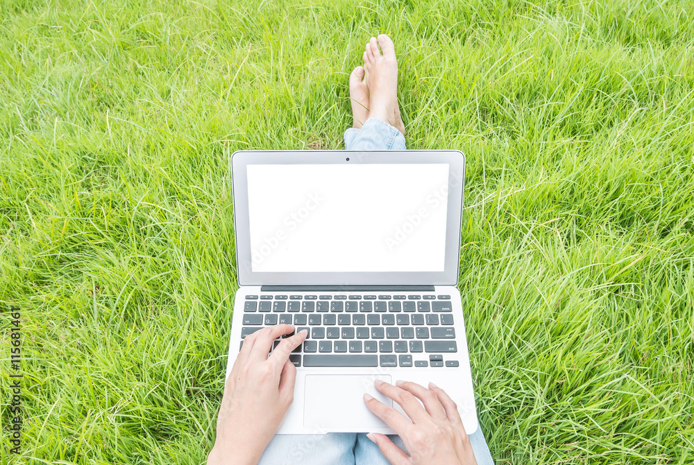 Asian woman sitting on grass floor in the garden textured background ...