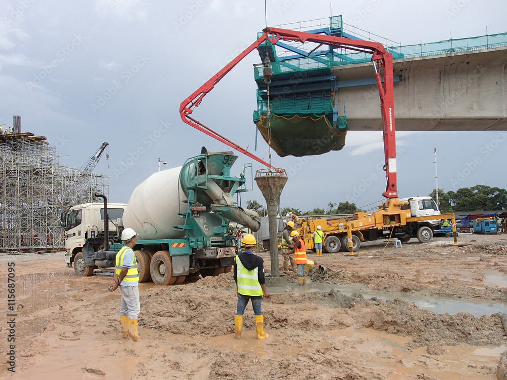 Bore pile concreting work at construction site. Wet concrete pour or ...