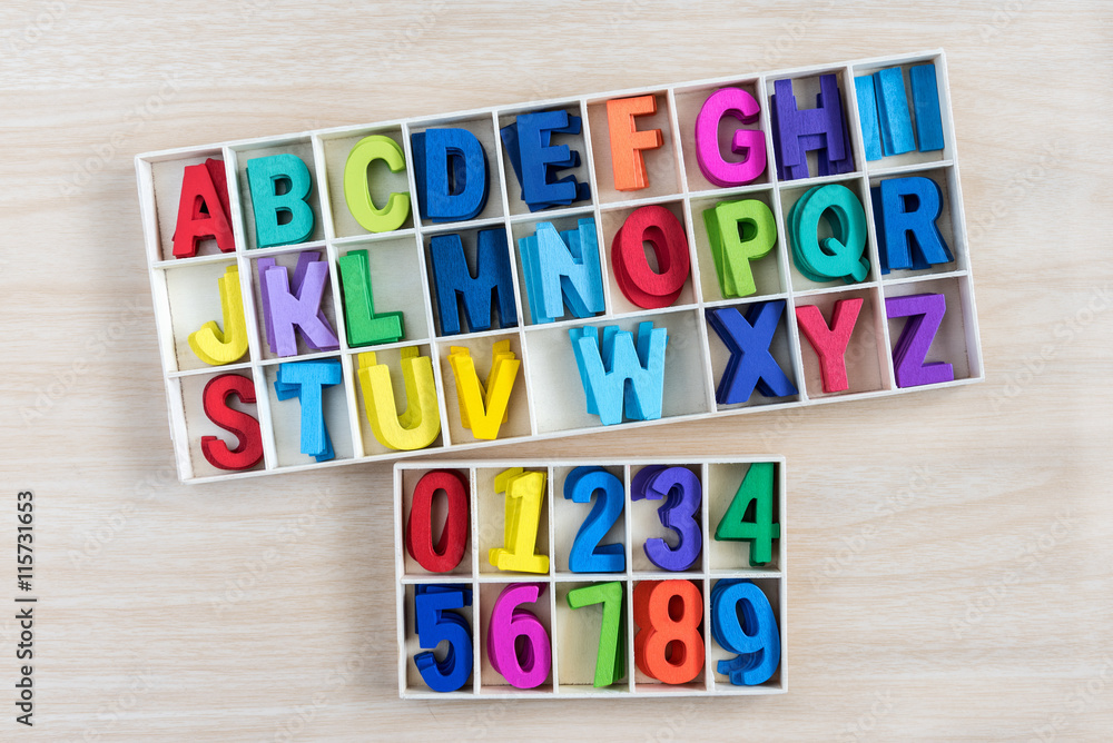 colorful alphabet letters and number in a wooden box with square ...