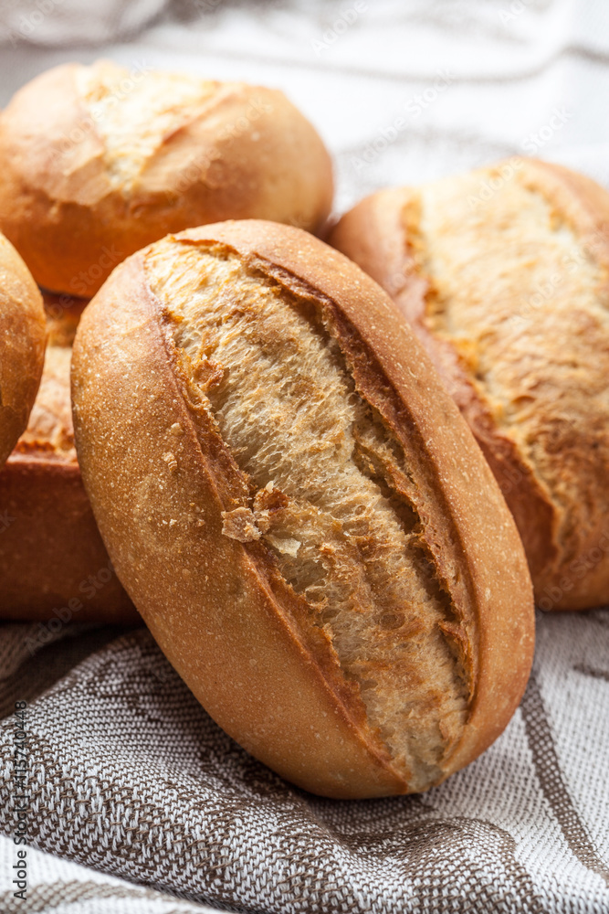 Freshly baked crusty rolls Stock Photo | Adobe Stock