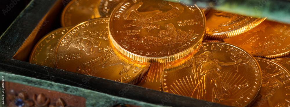 Collection of one ounce gold coins Stock Photo | Adobe Stock