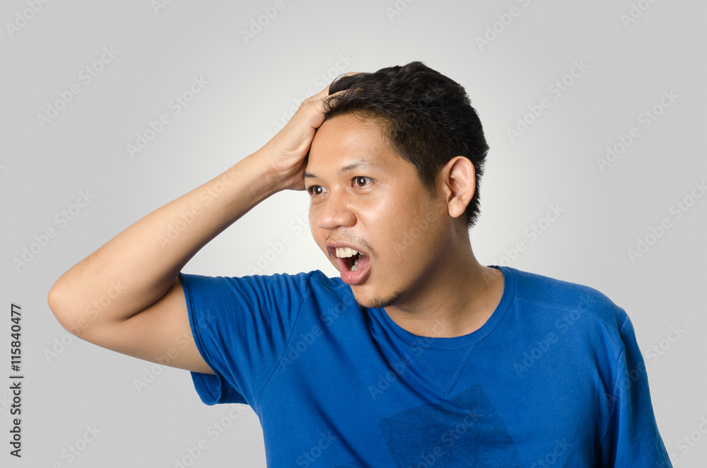 Asia man is feeling shock, isolated on gray background Stock Photo ...