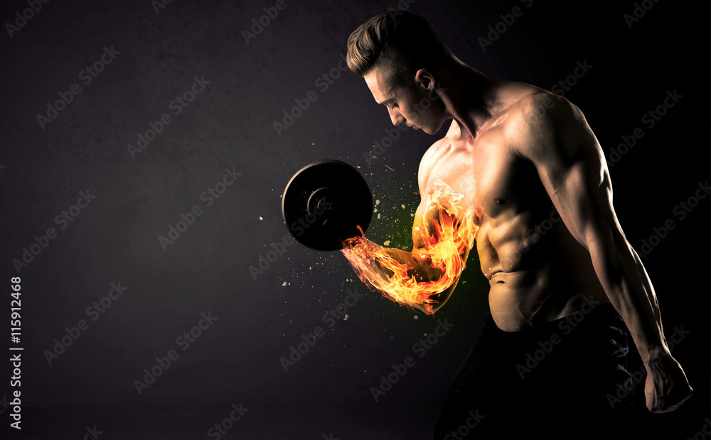 Bodybuilder athlete lifting weight with fire explode arm concept Stock ...