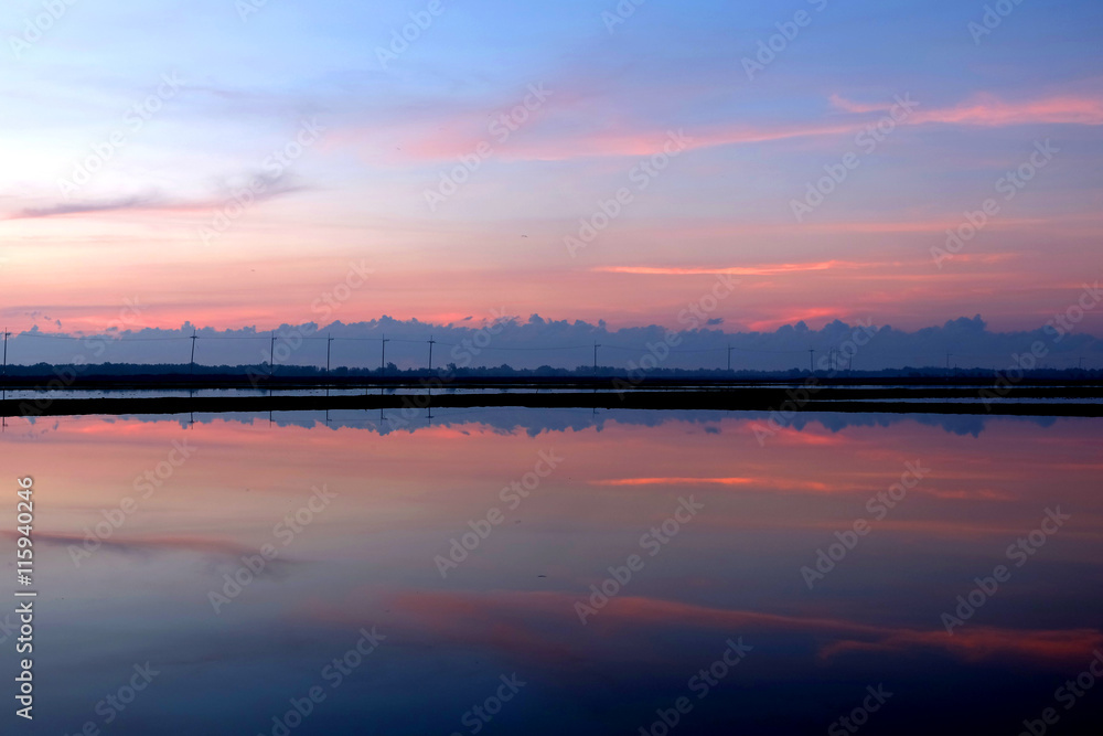 BLUE SALT PAN The salt pans or salt evaporation pond reflected the blue ...