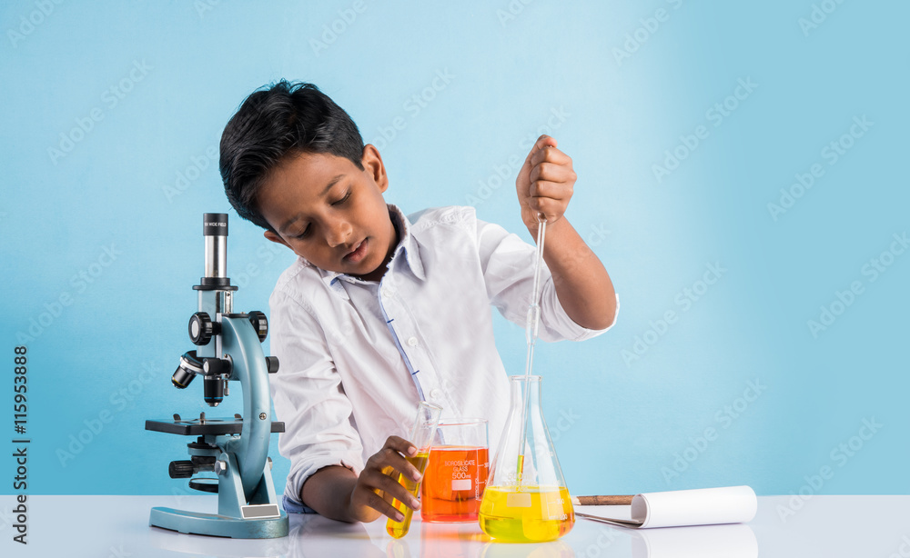 indian boy and chemistry experiment and microscope, asian boy with ...