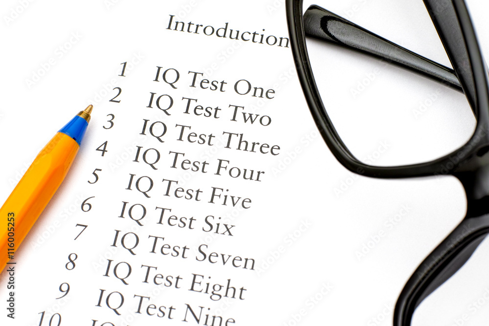 Contents book with Introduction and IQ Tests with glasses and ballpoint ...