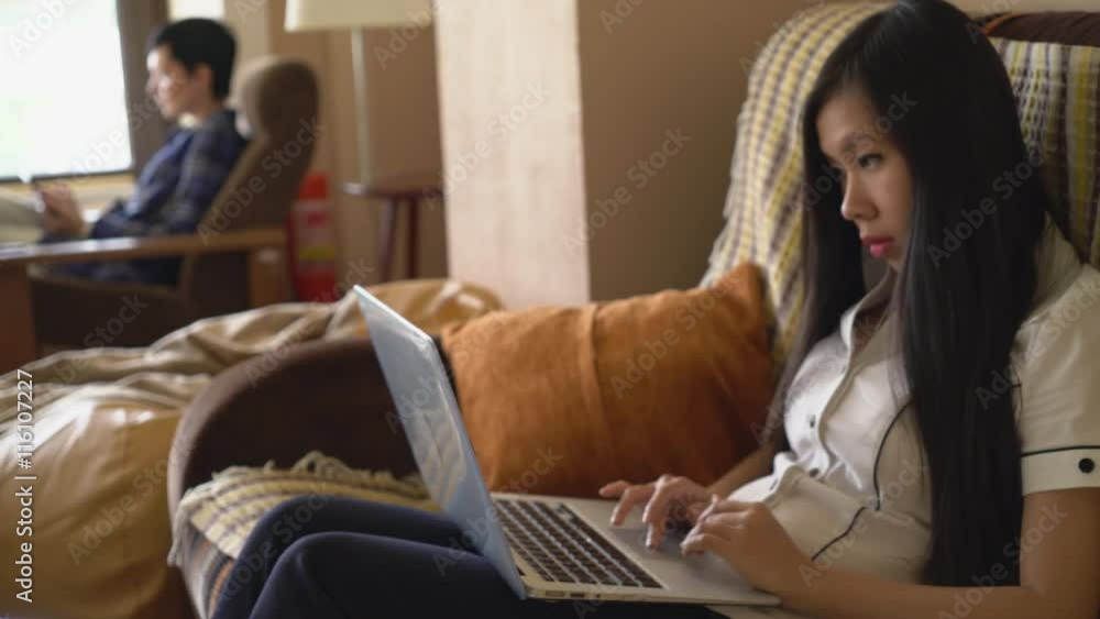 Portrait asian beautiful woman typing on laptop using internet. Female ...