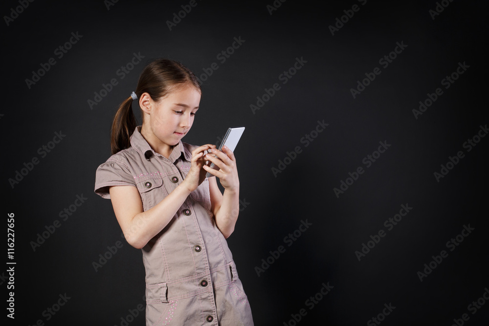 Portrait of serious girl touch screen on mobile phone Stock Photo ...