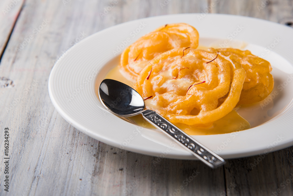 jalebi with rabdi made from condensing milk, famous dessert sweet from ...