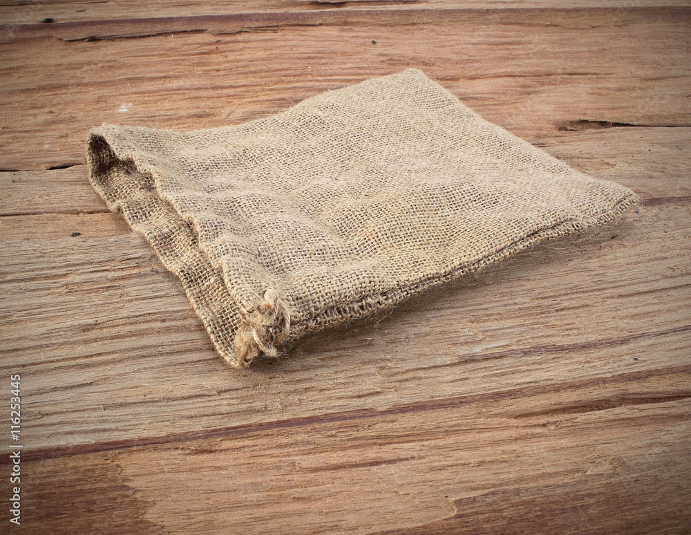 Sack bag on the wooden floor Stock Photo | Adobe Stock