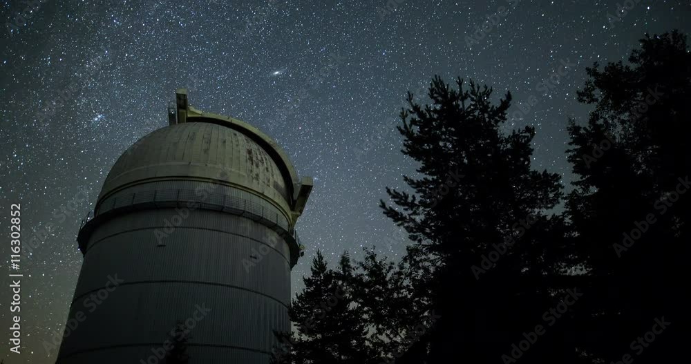 Rozhen astronomical observatory under the night sky stars. Blue sky ...