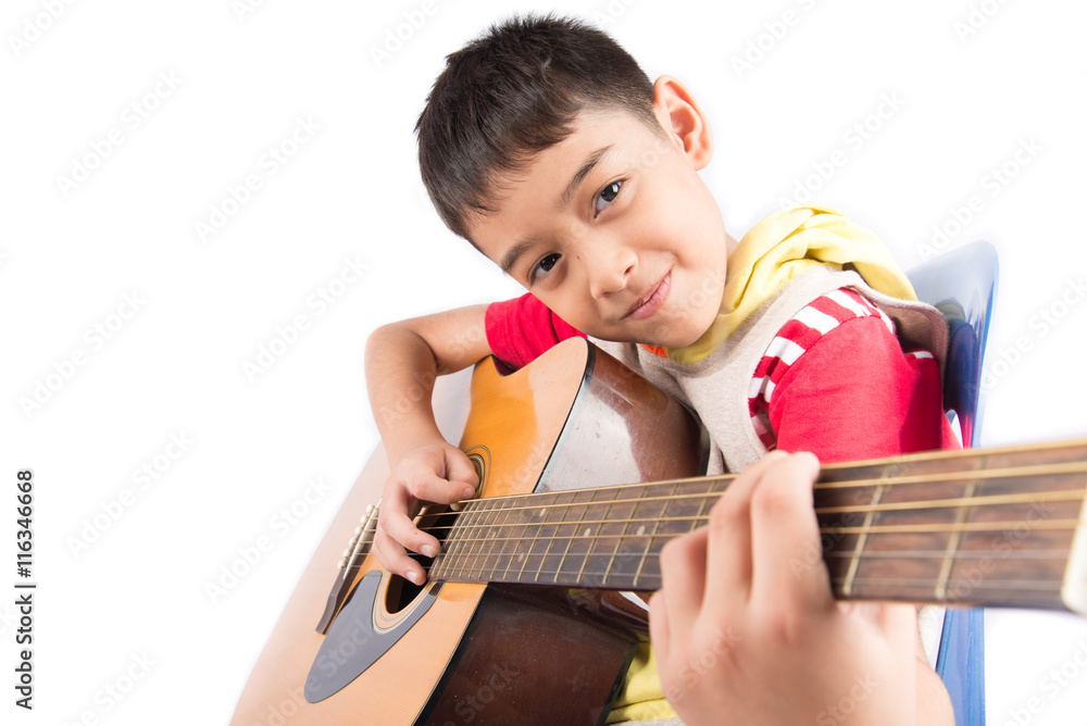 Little boy playing classic guitar on white background Stock Photo ...