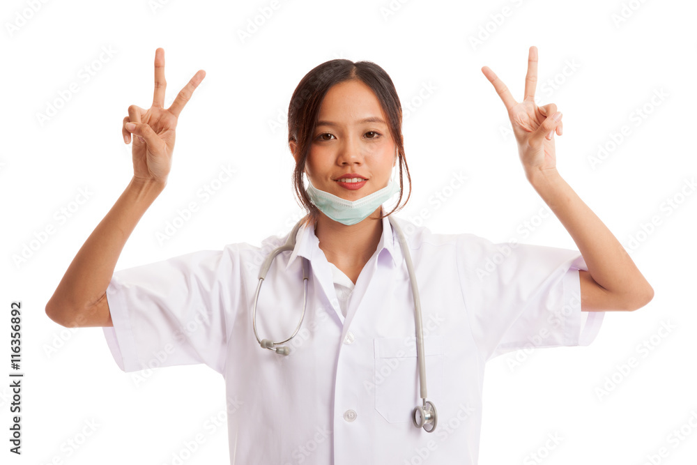 Young Asian female doctor show victory sign with both hands isolated on ...