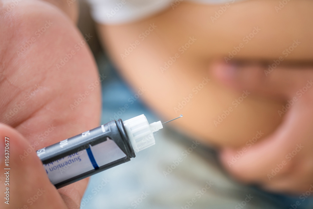 Male diabetes patient holding syringe for insulin injection with Stock ...