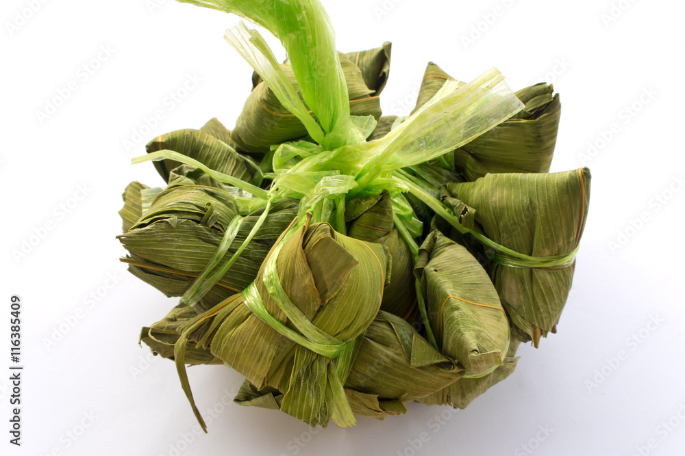 Steamed glutinous rice wrapped in bamboo leaf Stock Photo | Adobe Stock