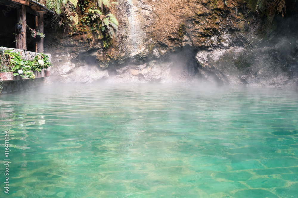 Haze over the natural pool of Fuentes Georginas hot springs around ...