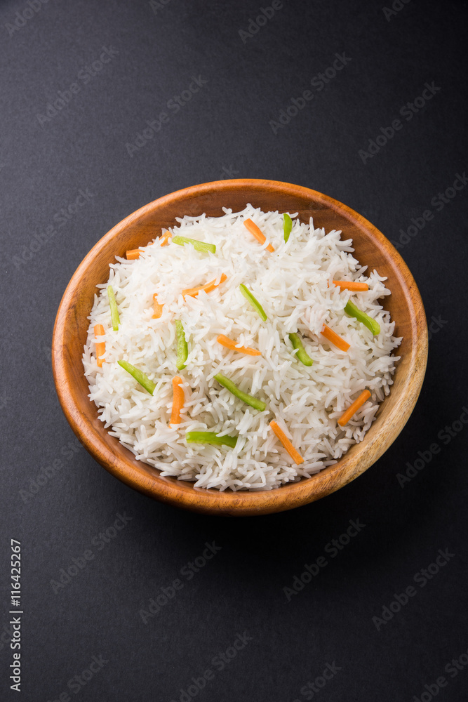 cooked white basmati rice with carrot and capsicum toppings, plain ...