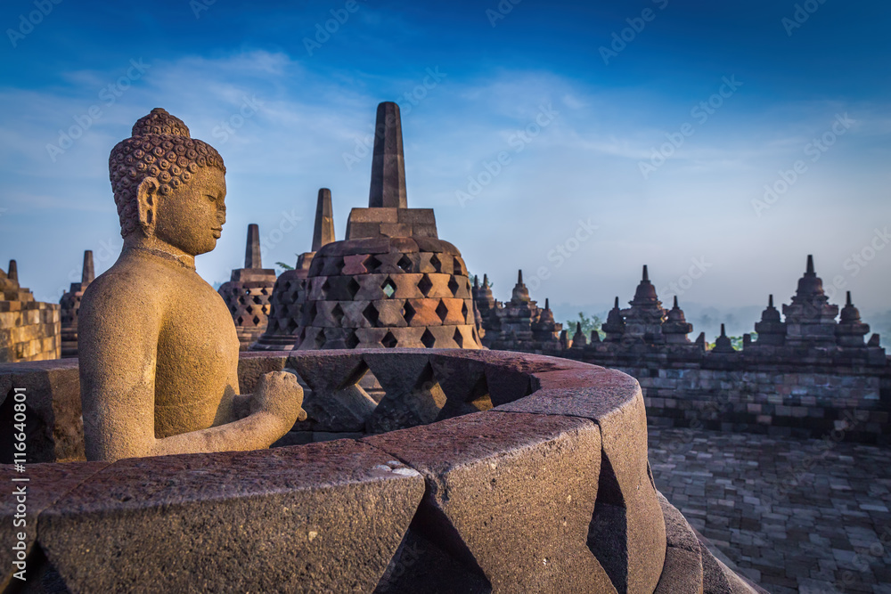 Buddha statue in Borobudur Temple, Java island, Indonesia. Stock Photo ...