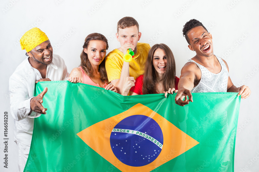 Group of multiracial people holding a Brazil flag Stock Photo | Adobe Stock