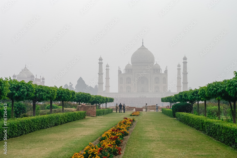 Taj Mahal view in morning fog from across the Mehtab Bagh or The ...
