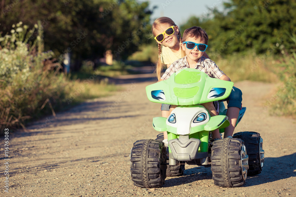 Happy children playing on the road at the day time. Stock Photo | Adobe ...