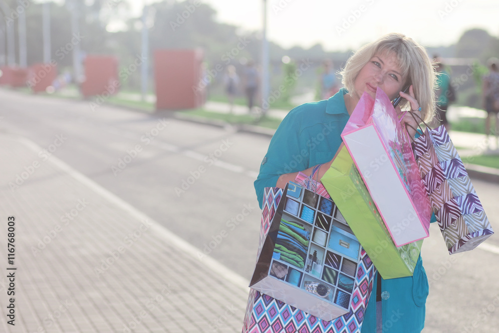 woman shopping in summer Stock Photo | Adobe Stock