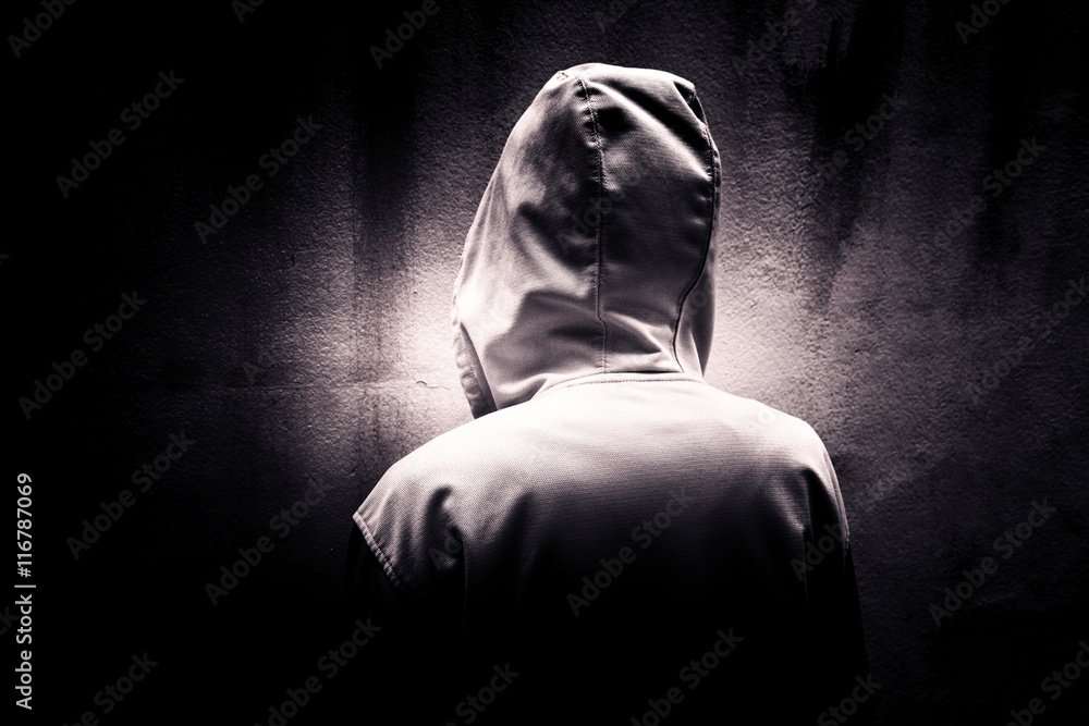 Back side of mysterious woman wearing hoodie hiding in the dark,Scary ...