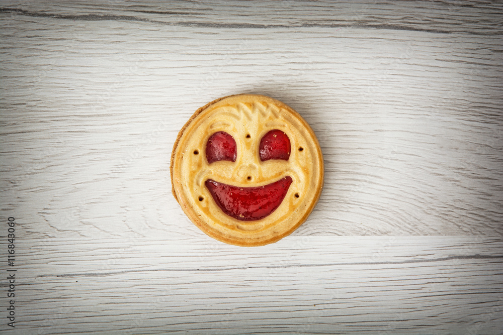 One round biscuit smiling face, humorous sweet food Stock Photo | Adobe ...