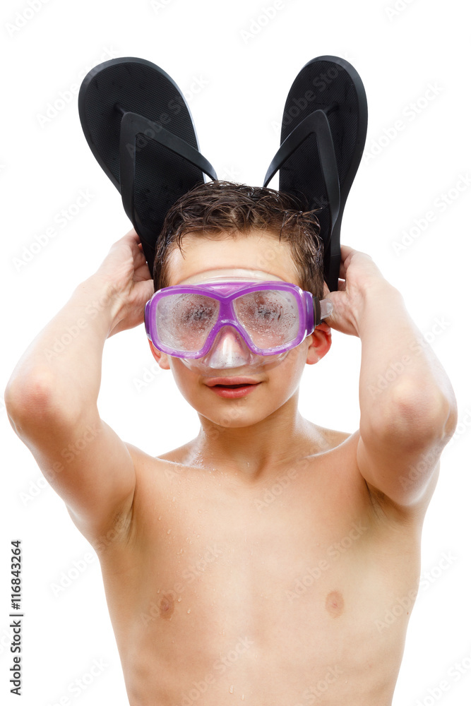 Boy diver in swimming mask with a happy face close-up portrait ...