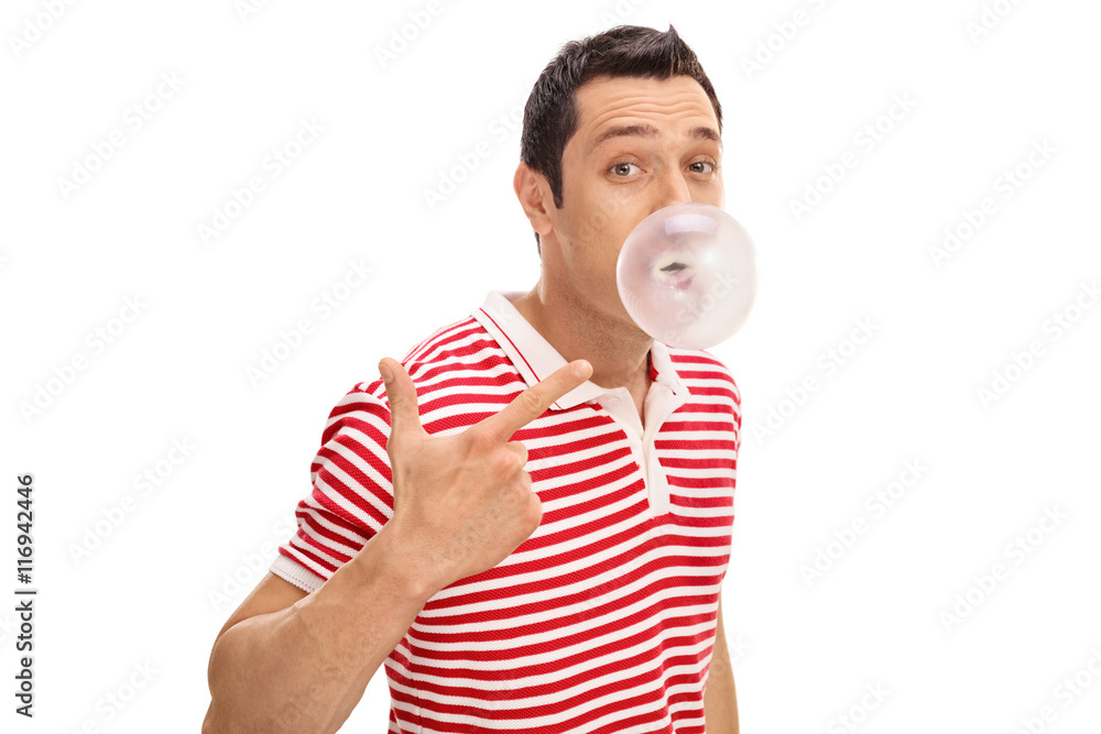 Man chewing a gum and blowing bubble Stock Photo | Adobe Stock