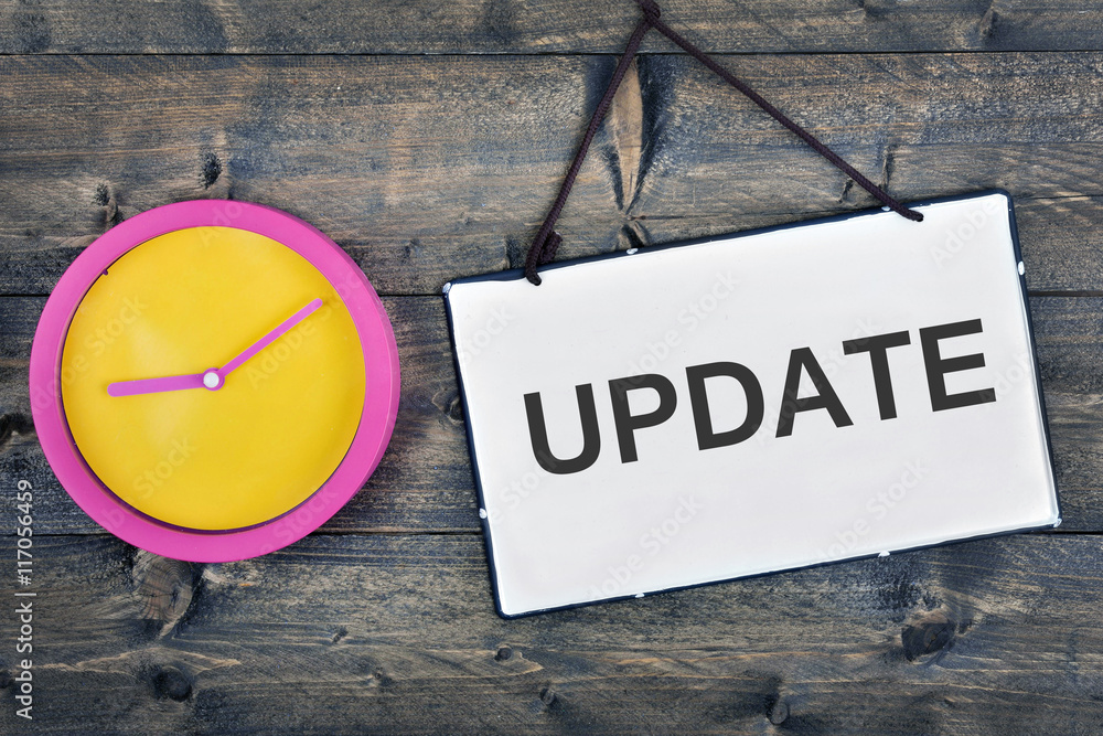 Update sign on wooden table Stock-Foto | Adobe Stock