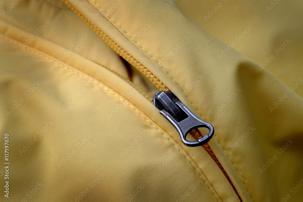 Zipper on Yellow Coat with Texture Stock Photo | Adobe Stock