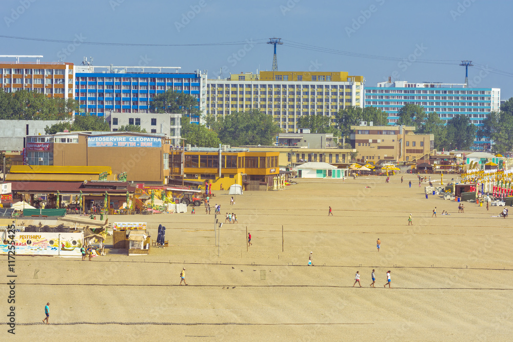People resting on beach on in Mamaia, Romania. Mamaia is the largest ...