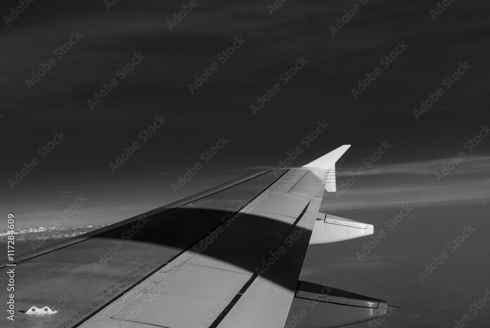 Image of airplane wing in flight. Abstract image of airplane wing ...