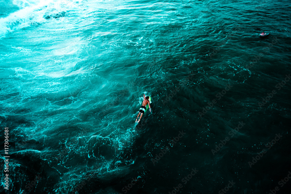 Person Floating On Water